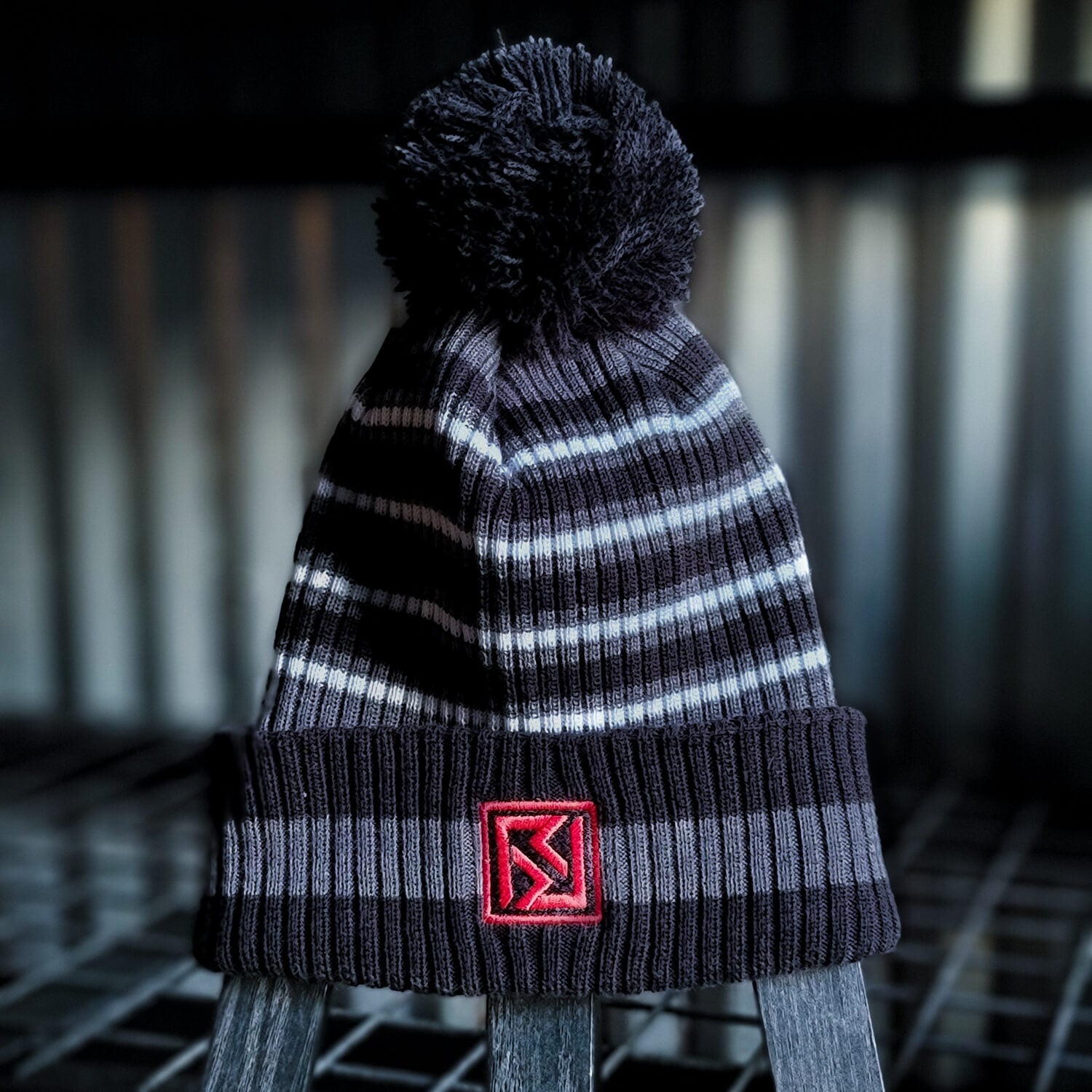 Shop | Original Logo Pom Beanie Black & Red | Revolution Mfg